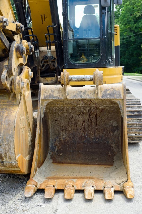 Excavator Bucket Closeup with the Vehicle Behind it Stock Image - Image ...