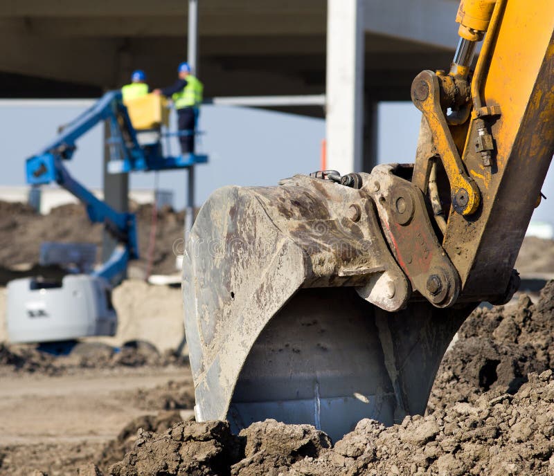 Excavator Bucket at Construction Site Stock Photo - Image of backhoe ...