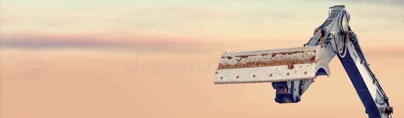 Excavator Bucket Raised Up on Construction Cite Stock Image - Image of ...