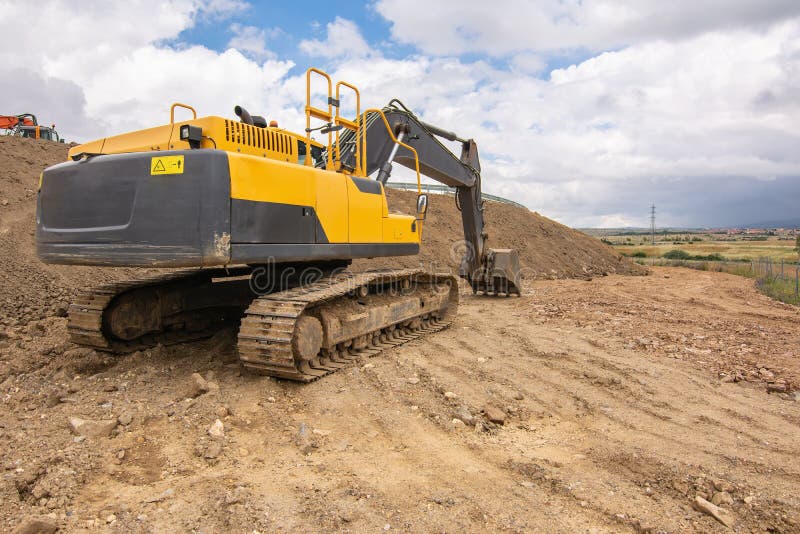 Excavator Building a Road in a Site Construction Stock Image - Image of ...