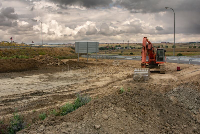 Excavator Building a Road in a Site Construction Stock Image - Image of ...