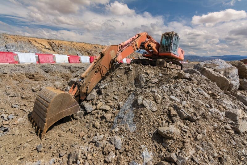 Excavator Building a Road in a Site Construction Stock Photo - Image of ...
