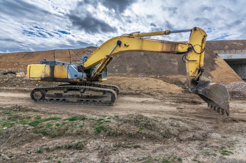 Excavator Building a Road in a Site Construction Stock Photo - Image of ...