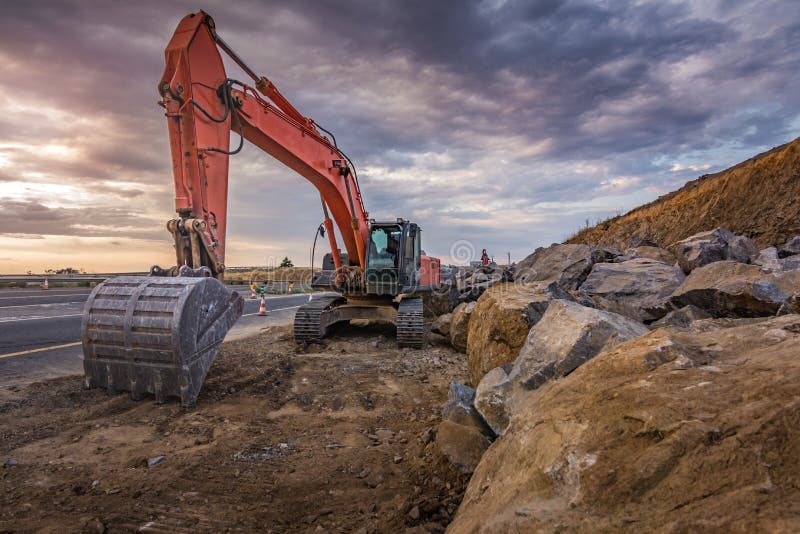 Excavator Building a Road in a Site Construction Stock Photo - Image of ...