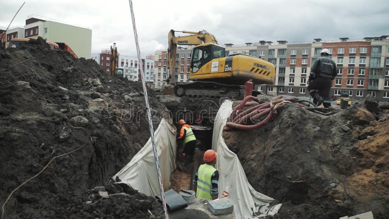 Workers in Hard Hats Sitting on Side of the Road in Bangkok, Thailand ...