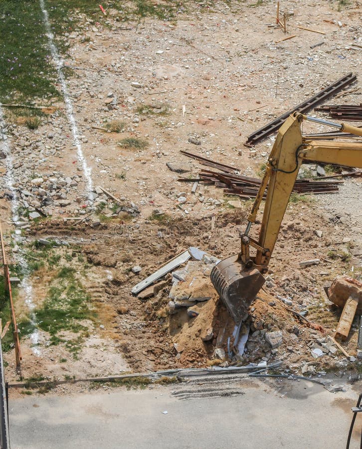 Excavator and Bulldozer Loader Close-up on a Modern Frame Shop Under ...