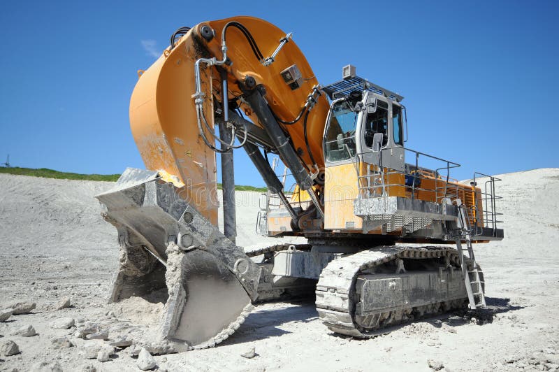 Excavator in a Chalk Rock Quarry. Mining Industry. Stock Image - Image ...