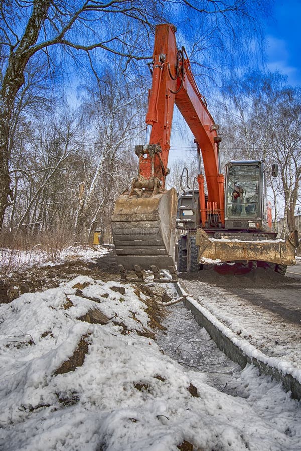 Excavator clean stock image. Image of street, cold, removing - 107767219