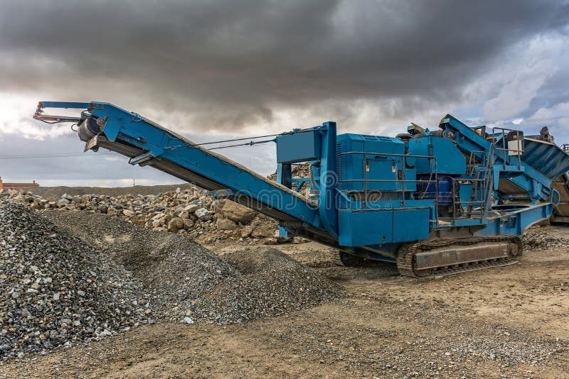 Excavator Collecting Stone in an Open-cast Mine Stock Image - Image of ...