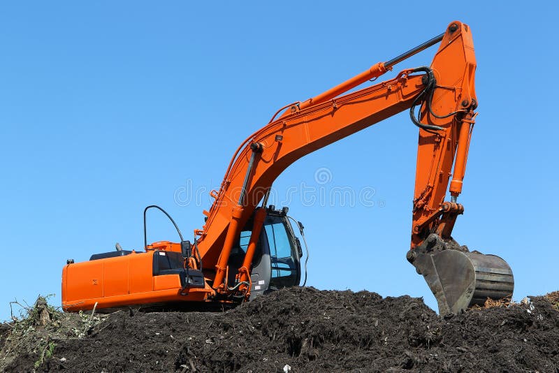 Excavator on a Compost Heap Stock Photo - Image of vehicle, loading ...