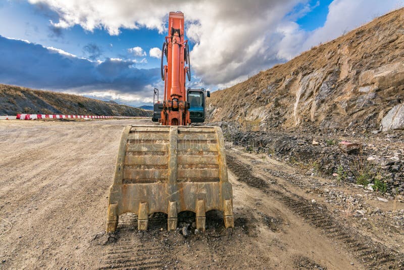 Excavator in the Construction of a Highway Stock Image - Image of ...