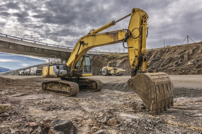 Excavator in the Construction of a Highway Stock Image - Image of ...
