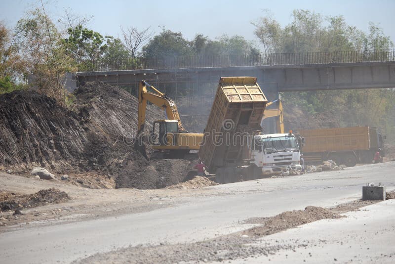 Excavator Construction Machinery is Working on Road Projects and ...