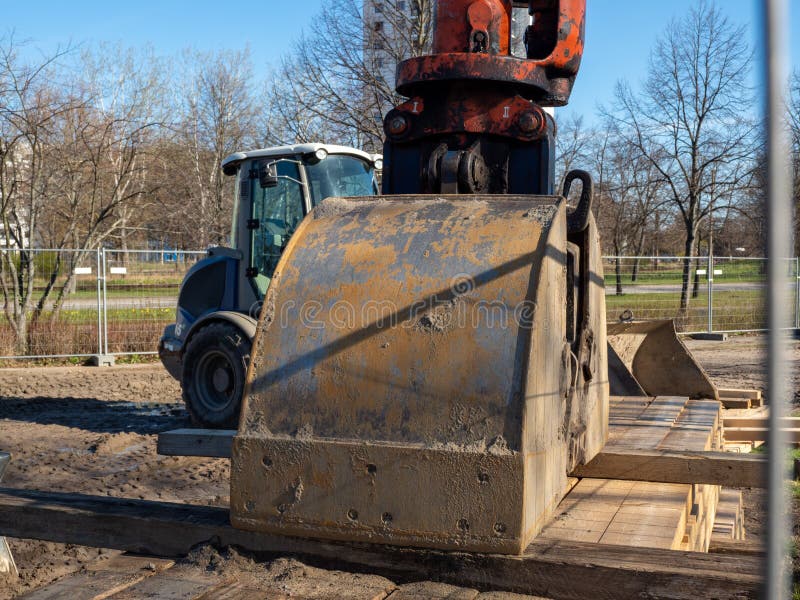 Excavator at a Construction Site in the City. Stock Image - Image of ...