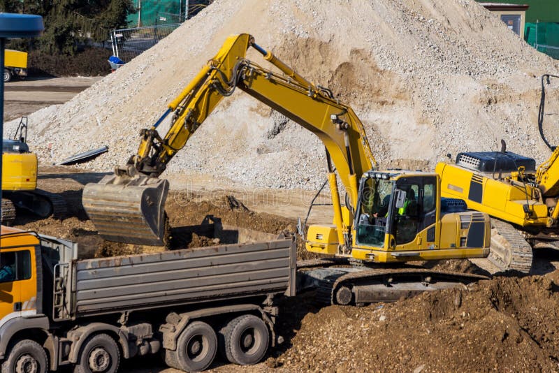 Excavator at Construction Site during Excavation Stock Photo - Image of ...