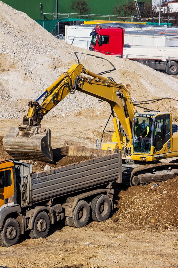 Excavator at Construction Site during Excavation Stock Photo - Image of ...