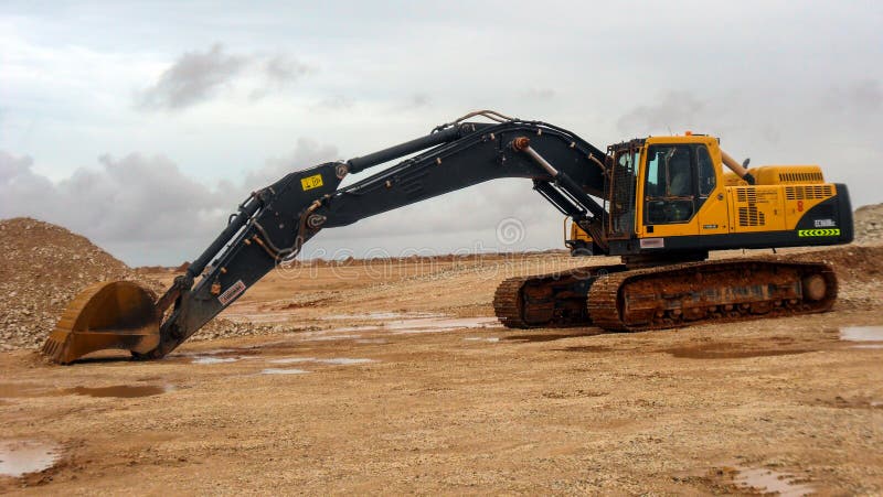 Excavator on the Construction Site Editorial Photo - Image of dramatic ...