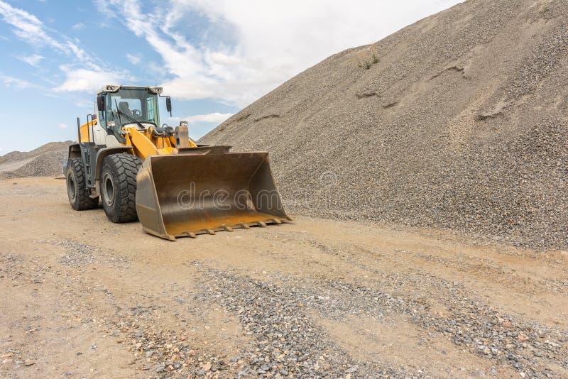 Excavator at a Construction Site in the Extraction of Stone and Rock ...