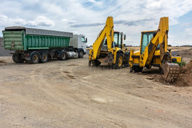 Excavator at a Construction Site in the Extraction of Stone and Rock ...