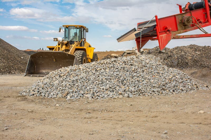 Excavator at a Construction Site in the Extraction of Stone and Rock ...