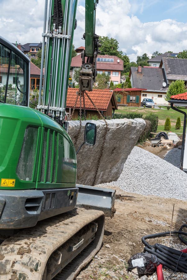 Excavator on Construction Site with Granite Slab Editorial Image ...