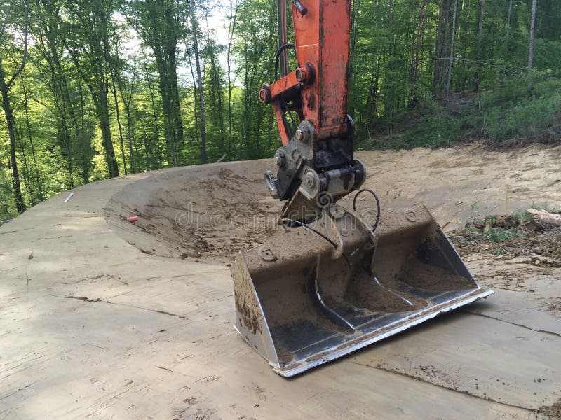 Excavator at a Construction Site Stock Photo - Image of construction ...
