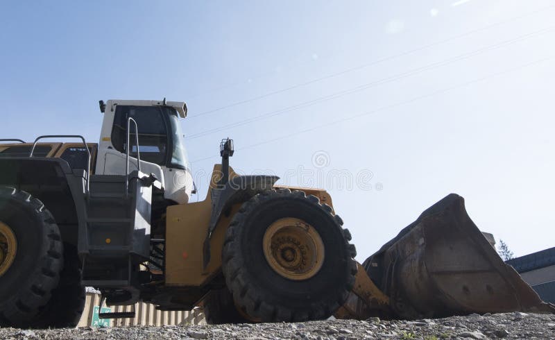 Excavator at a Construction Site Stock Photo - Image of load ...
