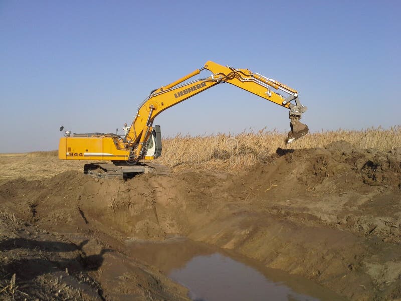 Excavator at a Construction Site Editorial Stock Image - Image of ...