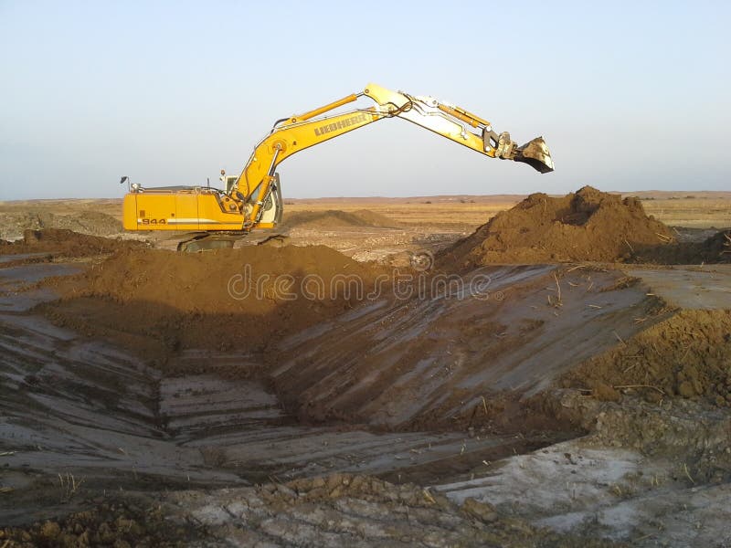 Excavator at a Construction Site Editorial Image - Image of load ...