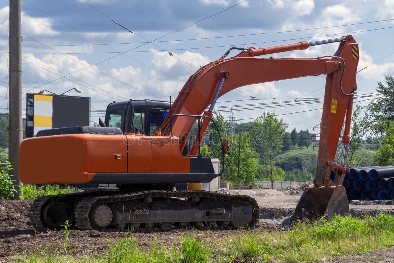 Excavator at a Construction Site. Excavator Loader Machine during ...