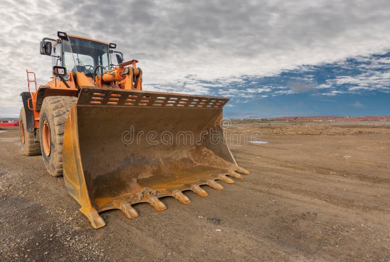 Excavator at a Construction Site, Performing Earth Moving Work Stock ...