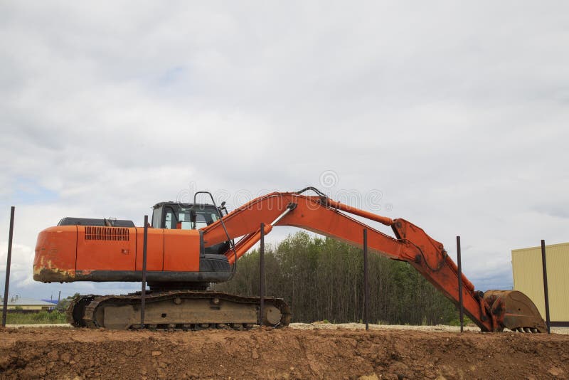 An Excavator on a Construction Site. Special Equipment for Construction ...
