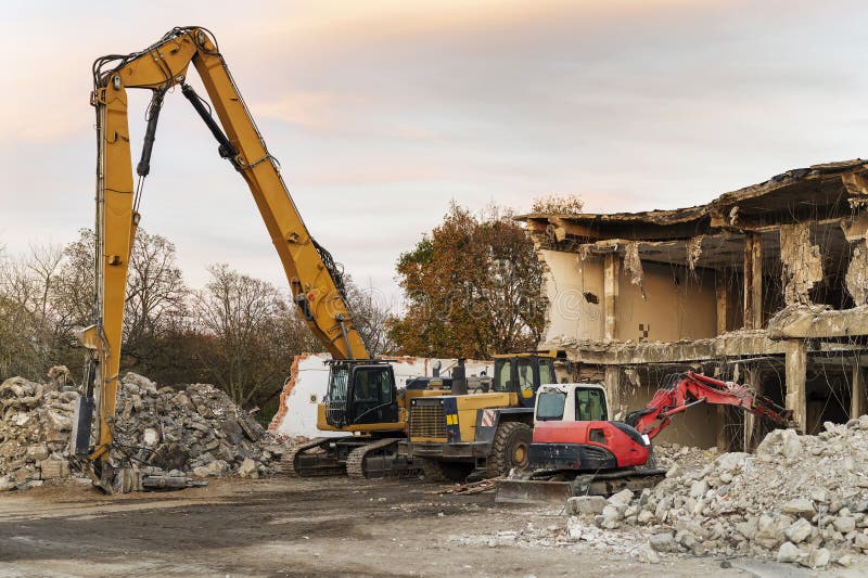 Various Construction Machines during the Demolition of a Building Stock ...