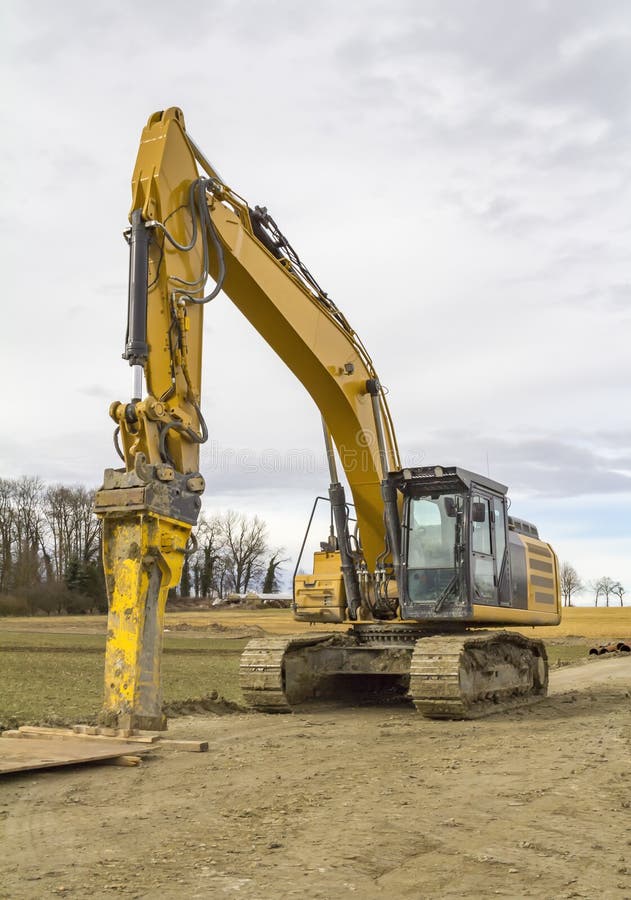 Excavator at a Construction Site Stock Image - Image of digging, metal ...