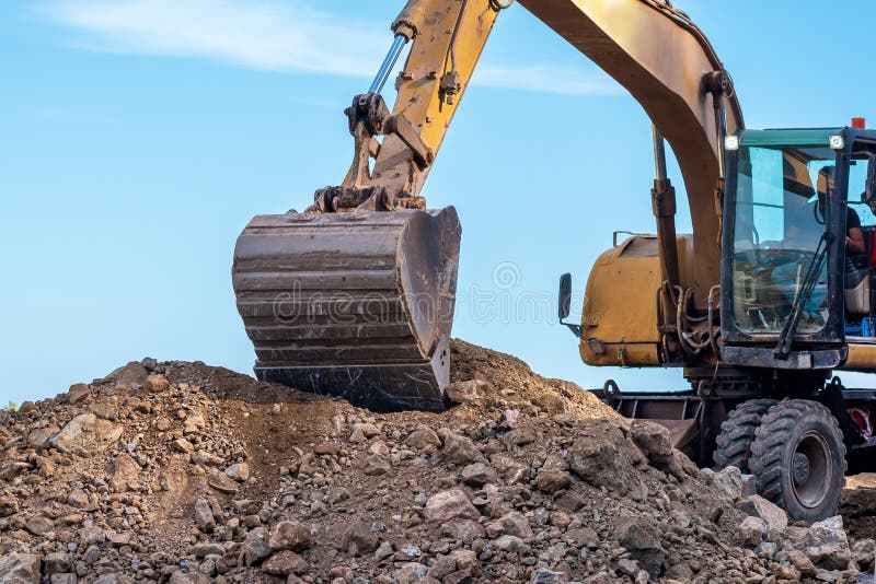 Excavator at Construction Works Close Up Stock Photo - Image of sand ...