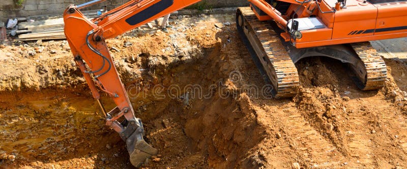 Excavator Continues To Work at the Construction Site Stock Image ...
