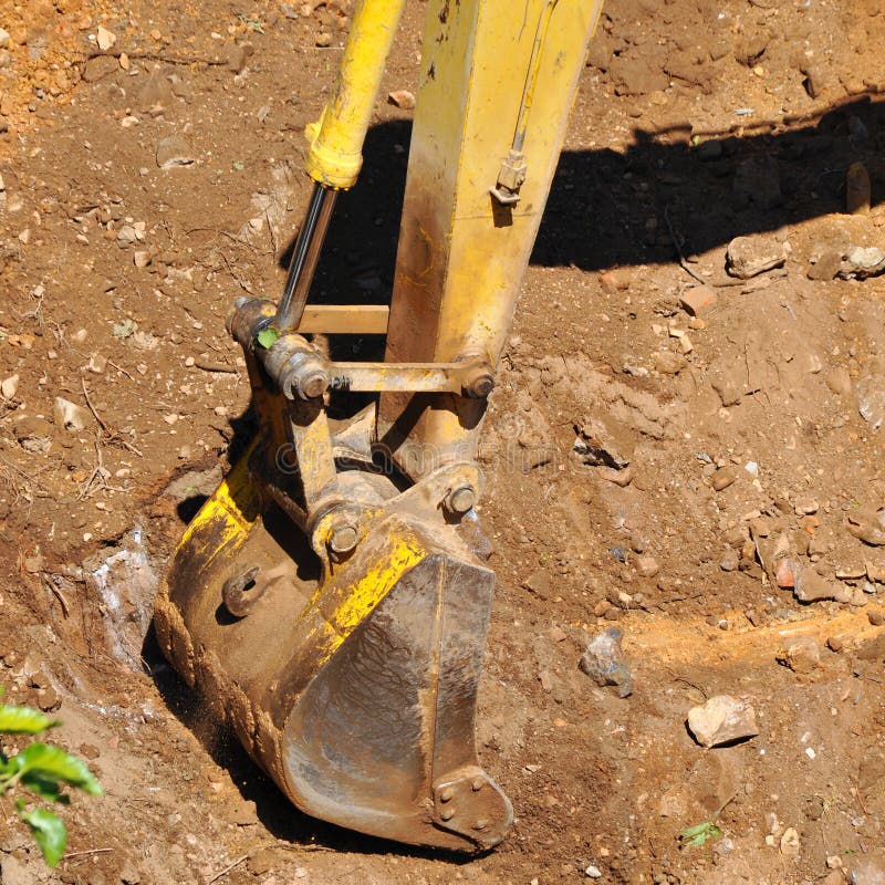 Excavator Continues To Work at the Construction Site Stock Image ...