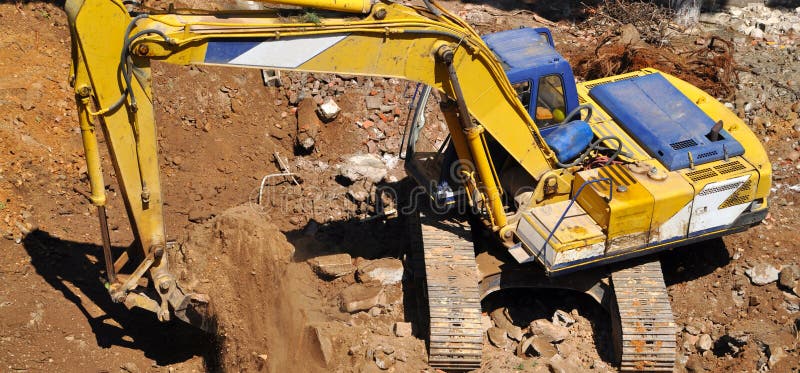 Excavator Continues To Work at the Construction Site Stock Image ...