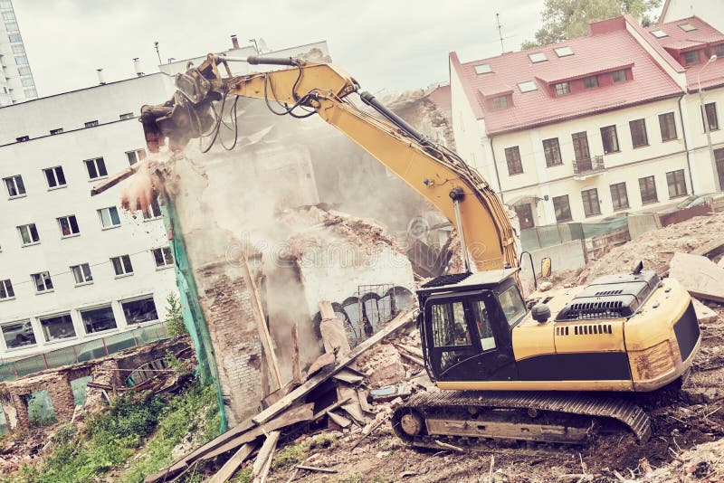 Excavator Crasher Machine at Demolition on Construction Site Stock ...