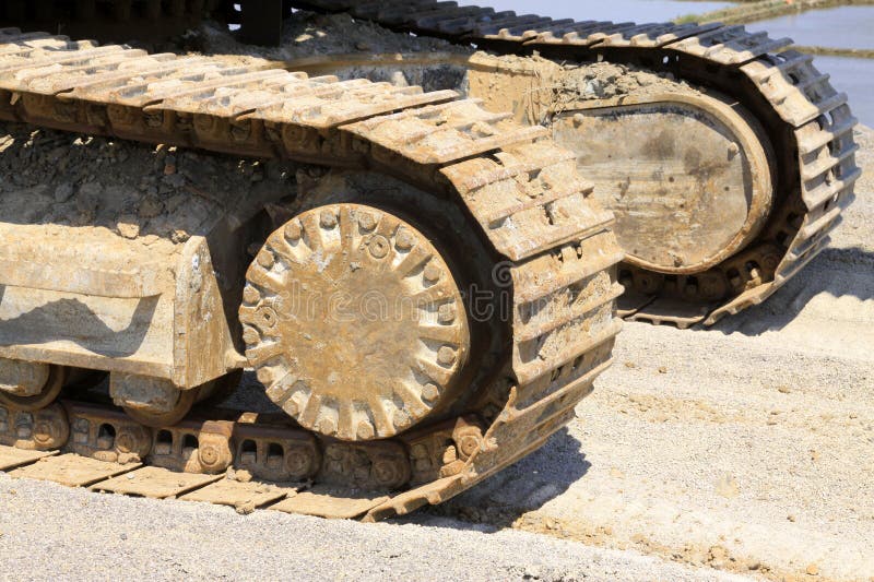 Excavator crawler features stock image. Image of solid - 394956625