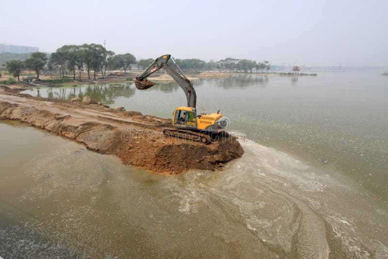 Excavator in a Dam Construction Site Stock Image - Image of turkmen ...