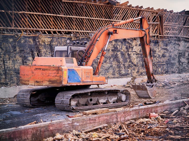 Excavator at Demolition Site Breaking Down the Building Stock Photo ...