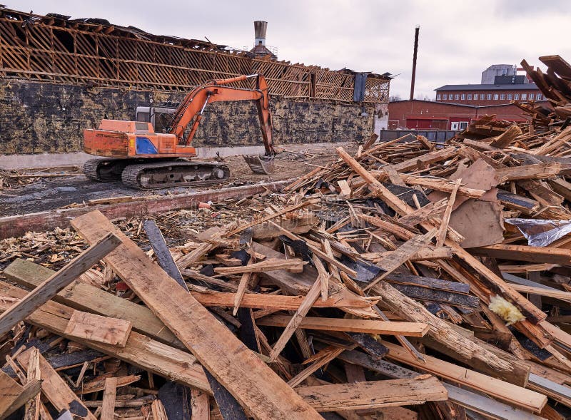 Excavator at Demolition Site Breaking Down the Building Stock Photo ...