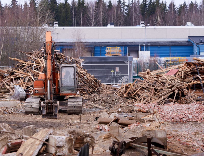 Excavator at Demolition Site Breaking Down the Building Stock Image ...