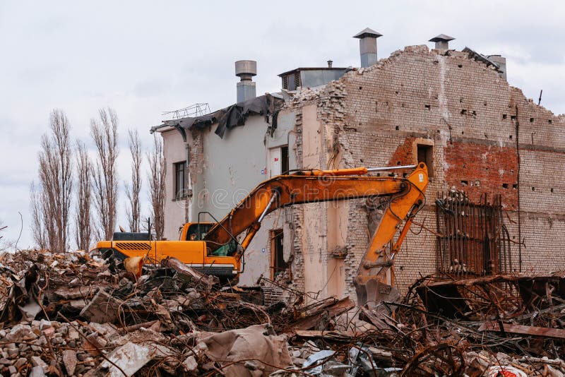 Excavator on Demolition Site. Process of Demolition of Old Industrial ...