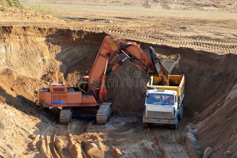 Excavator Developing the Sand in the Opencast and Loading it To the ...