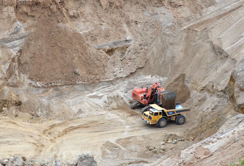 Excavator Developing the Sand on the Opencast and Loading it To the ...