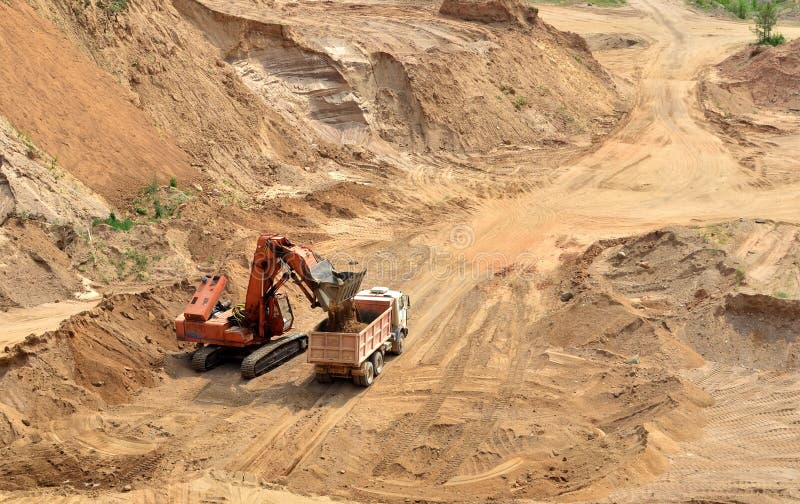 Excavator Developing the Sand on the Opencast and Loading it To the ...
