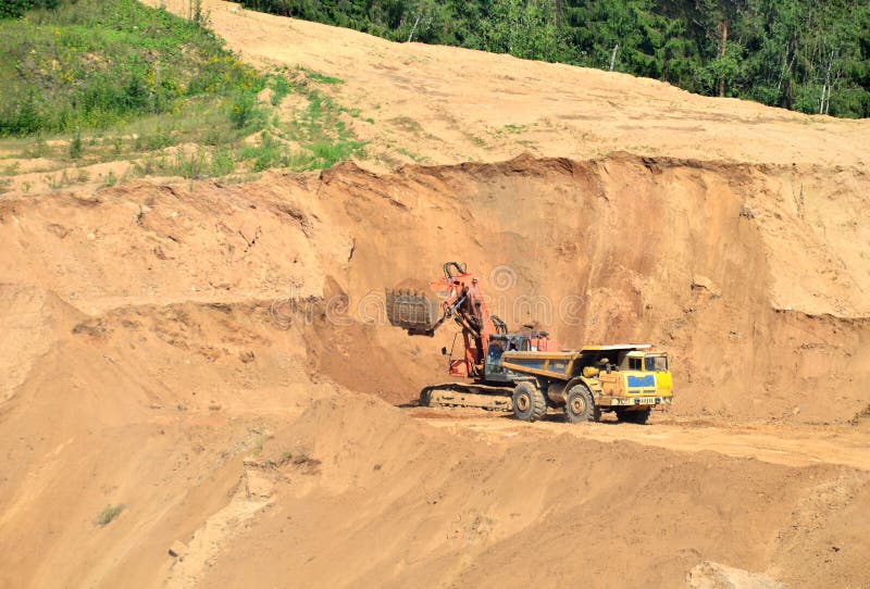 Excavator Developing the Sand in the Opencast and Loading it To the ...