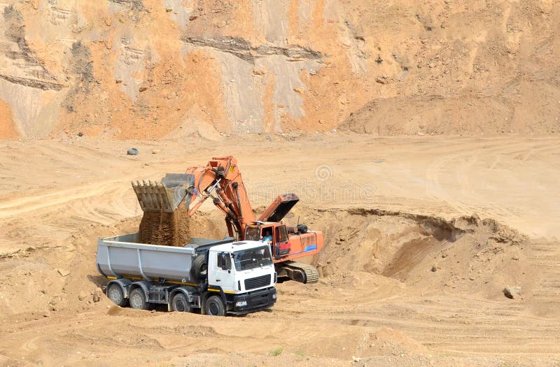 Excavator, Dump Truck and Wheel Loader at Landfill for Disposal of ...